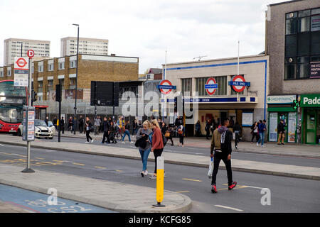 The busy entrance to Mile End Tube Station, London on a weekday ...