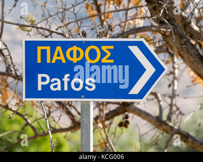 Road sign in the village of Episkopi written in English and Greek ...