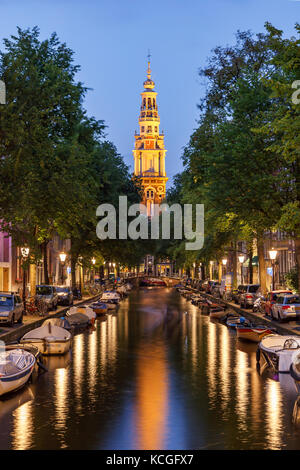evening view on prinsengracht in amsterdam with westkerk lanterns ...