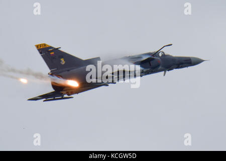 Colombian Air Force Kfir fighter jet crew chief signals a Kfir pilot on ...