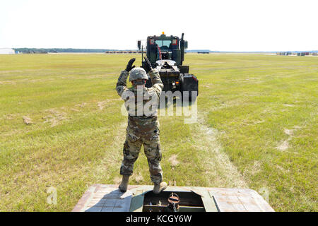A U.S. Marine assigned to Engineer Equipment Instruction Company ...