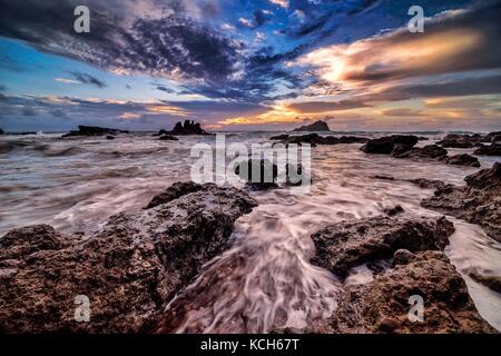 Koki Beach Park, Maui. The dark red sand at Koki Beach produced by Ka ...