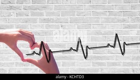 Digital composite of Heart beat over hands holding heart Stock Photo ...