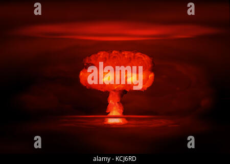 Atomic bomb realistic explosion, red color with smoke on black ...