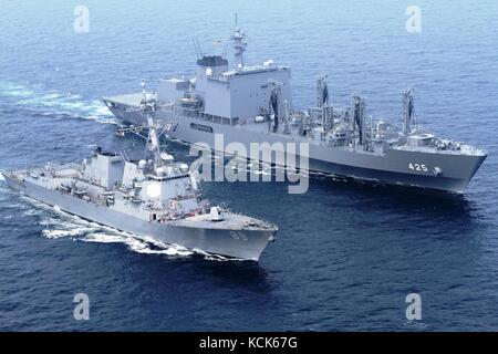 The Japanese Defense Ship, Mashu Class Oiler JDS MASHU (AOE 425) pulls ...