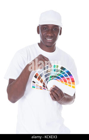 Young painter contractor isolated on white background Stock Photo - Alamy