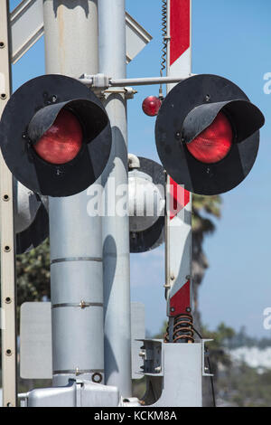 Close up of a railroad crossing light and barrier Stock Photo - Alamy