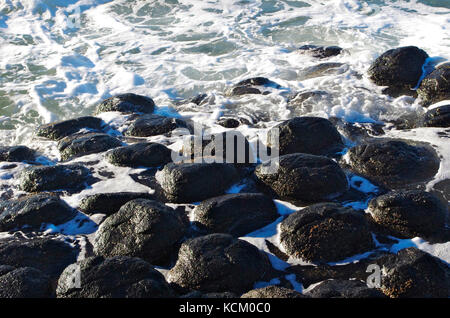 Exposed columnar structure of a basalt wave cut platform at Don Heads ...
