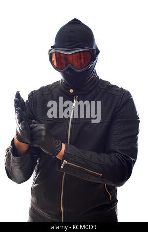 Dangerous burglar dressed in black wearing a mask on head - isolated ...