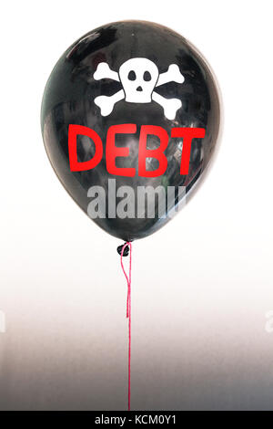 Debt and loan concept with the balloon Stock Photo - Alamy
