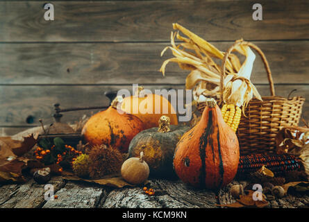 Happy Thanksgiving Day background, wooden table decorated with Pumpkins ...