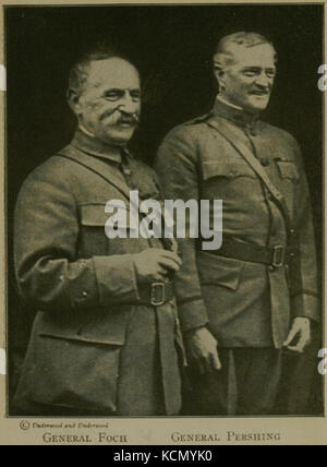 This historical photograph depicts two generals discussing a defense ...