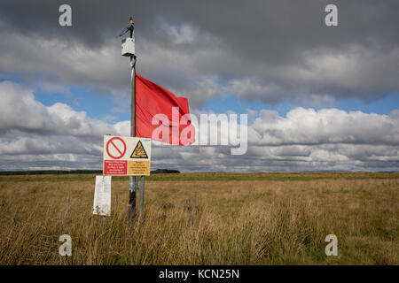 Red flag warning that the army firing ranges are in use on Garth Hill ...