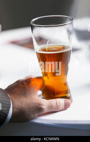 backlit beer showcases it's rich amber color Stock Photo - Alamy