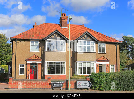 Detached bay window 1930s inter-war house with added garages Stock ...