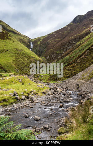 The Moffat Water Valley with Grey Mare's Tail waterfall, White Coomb ...