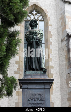 The statue of Ulrich Zwingli in the beautiful city of Zurich in ...