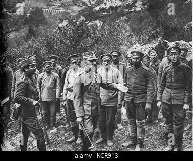 This historical photograph depicts Bulgarian soldiers in trenches ...