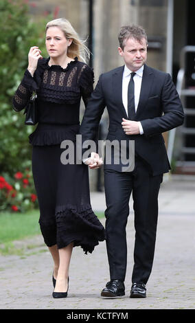 Declan Donnelly and his wife Ali Astall arrive for the funeral service ...