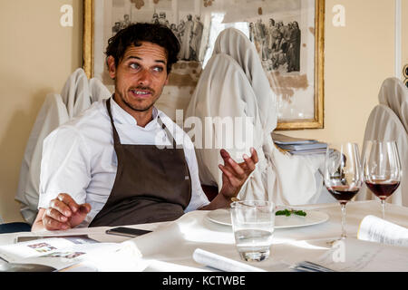 Michelin Star Chef Rodolfo Guzman preparing Lamb grilled in Style ao ...