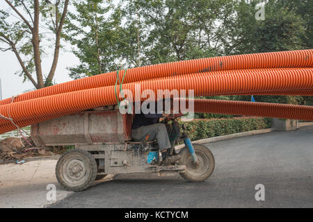Extraordinary load on a cycle - overloaded Stock Photo - Alamy