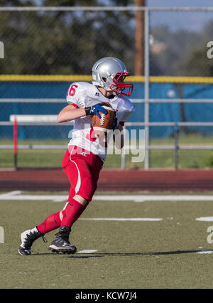 Football action with Trinity vs. University Prep High School in Redding ...