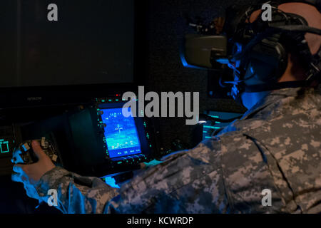 U.S. Soldiers assigned to the 108th Air Defense Artillery Brigade use a ...