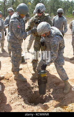 A 40-pound crater charge is set off by Florida National Guard Soldiers ...