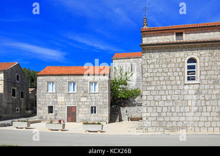 The square and Church of Our Lady of Snows, Pupnat, Korcula Island ...