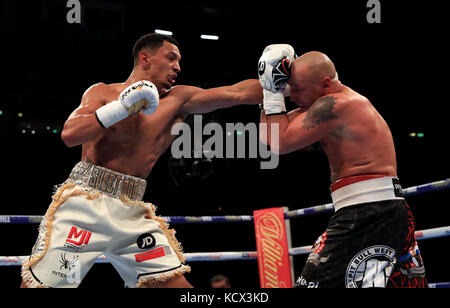 Marcus Morrison (left) in action against Mariusz Biskupski during their ...