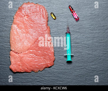 Food scientist injecting raw mea Stock Photo - Alamy