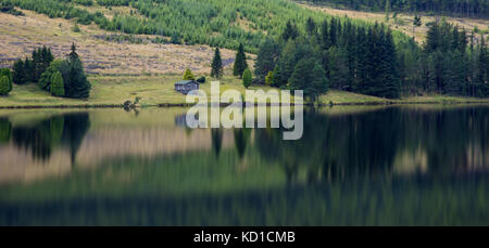 House on the bank of Backwater Reservoir, Angus, Scotland Stock Photo ...