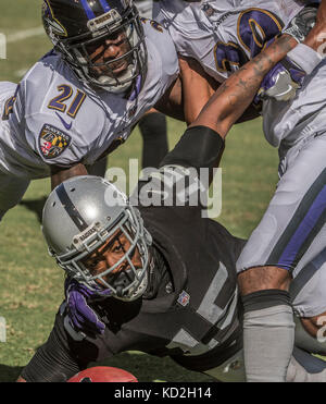 Baltimore Ravens defensive tackle Michael Pierce (97) holds his fumble ...