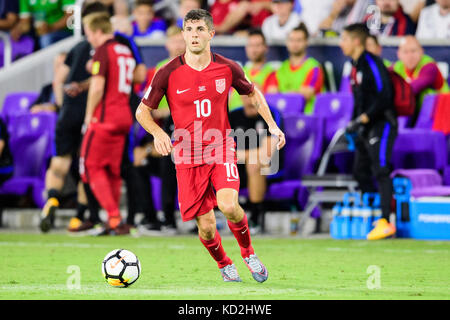 United States' Christian Pulisic (10), right, looks on from the ...