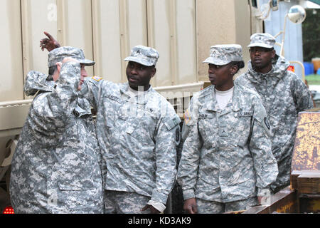 Trucks from the 1050th Transportation Battalion arrive at the Wateree ...