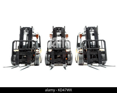 Parked forklift in an industry warehouse, workers and shelves in the ...