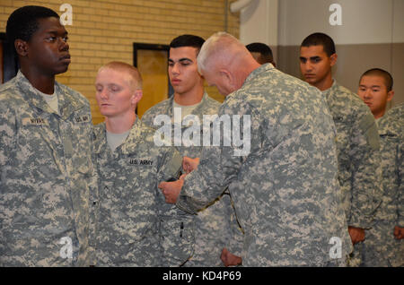 A representative with the 218th Maneuver Enhancement Brigade officially ...