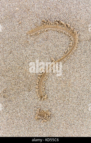 question mark drawn in the sand, a symbol of mystery and riddles Stock ...