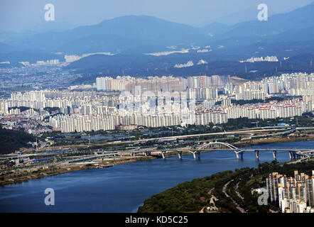 A view of the Han river and the Guri Amsa Bridge in Seoul, South Korea ...