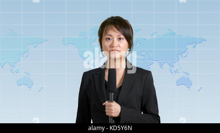 Asian American female news anchor in studio with map background, TV ...