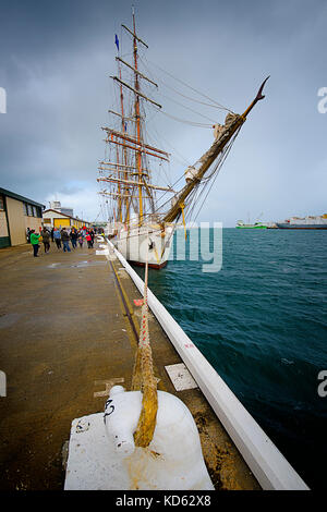 A sailing ship tied up at the quay in this North Norfolk port Stock ...