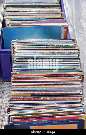 Stacked second hand vinyl records at flea market Stock Photo - Alamy
