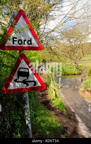 Warning signs at river ford, river crossing Stock Photo - Alamy