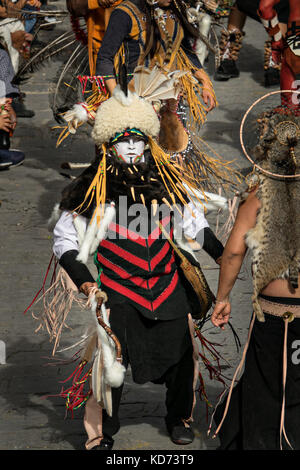 Concheros dance in a procession through the historic district during ...