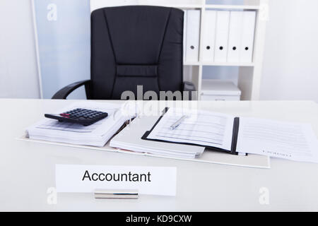 Accountant Name Plate On The Desk Stock Photo - Alamy
