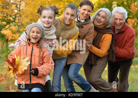 Beautiful big happy family having fun together outdoors Stock Photo - Alamy