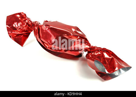 candy in red wrapper isolated on white background Stock Photo - Alamy