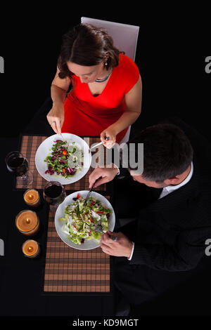 Top view of people eating food together Stock Photo - Alamy