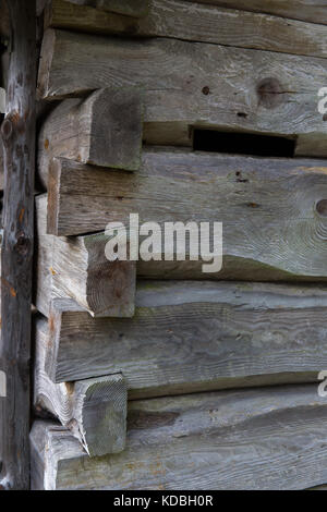Hand built wooden shepherds' hut in a rural garden with a table and ...
