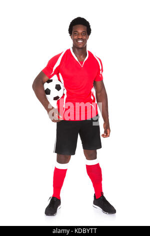 Afro american man over isolated background skeptic and nervous ...